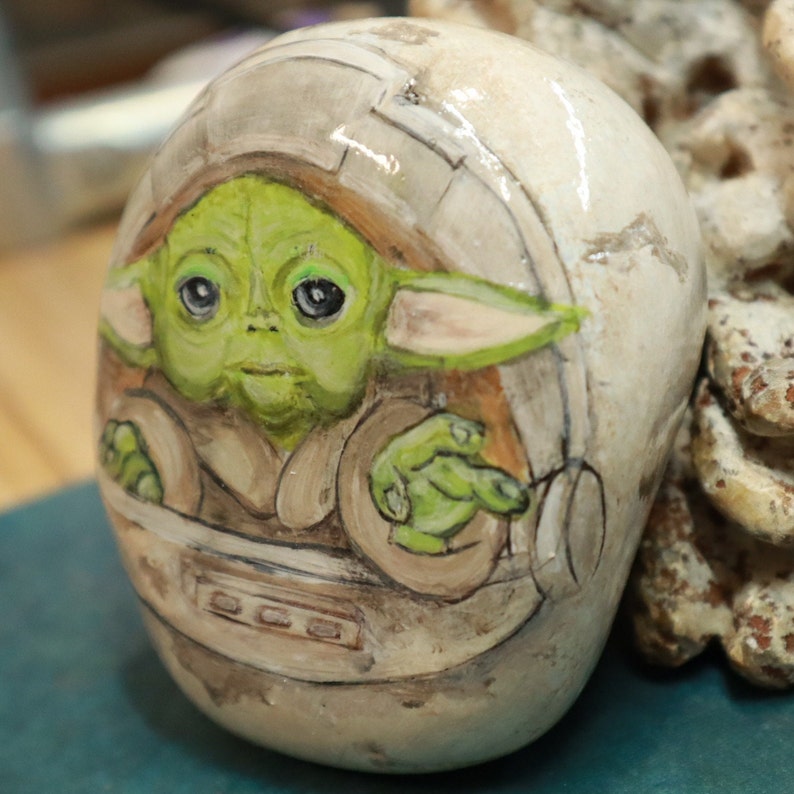Baby Yoda(aka Grogu) in Crib Pod Fanart on Painted Rock. - Etsy