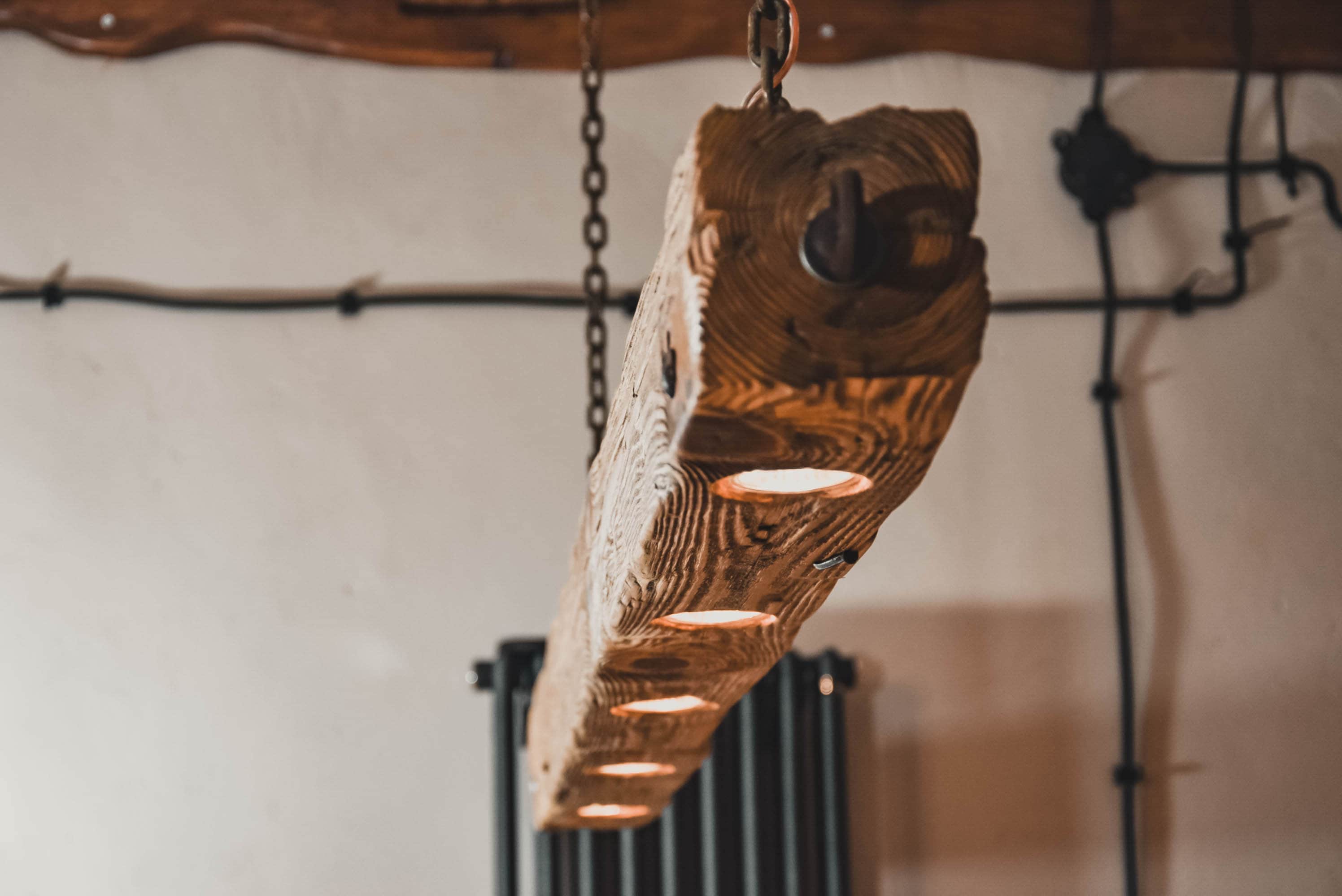 Long Wooden Beam Lamp Hanging on Chains in Rustic Style Long Wooden Beam Lamp Hanging on Chains in Rustic Style