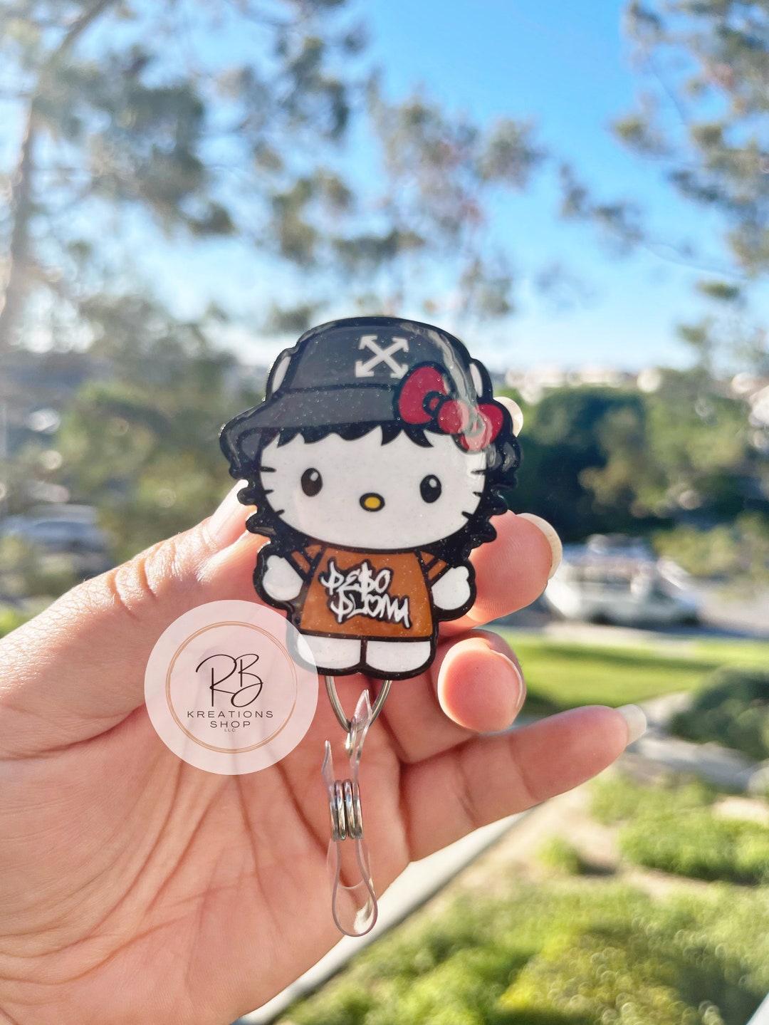 Peso Pluma Badge Reel | Kittie Peso Pluma Badge Reel | Badge Holder ...