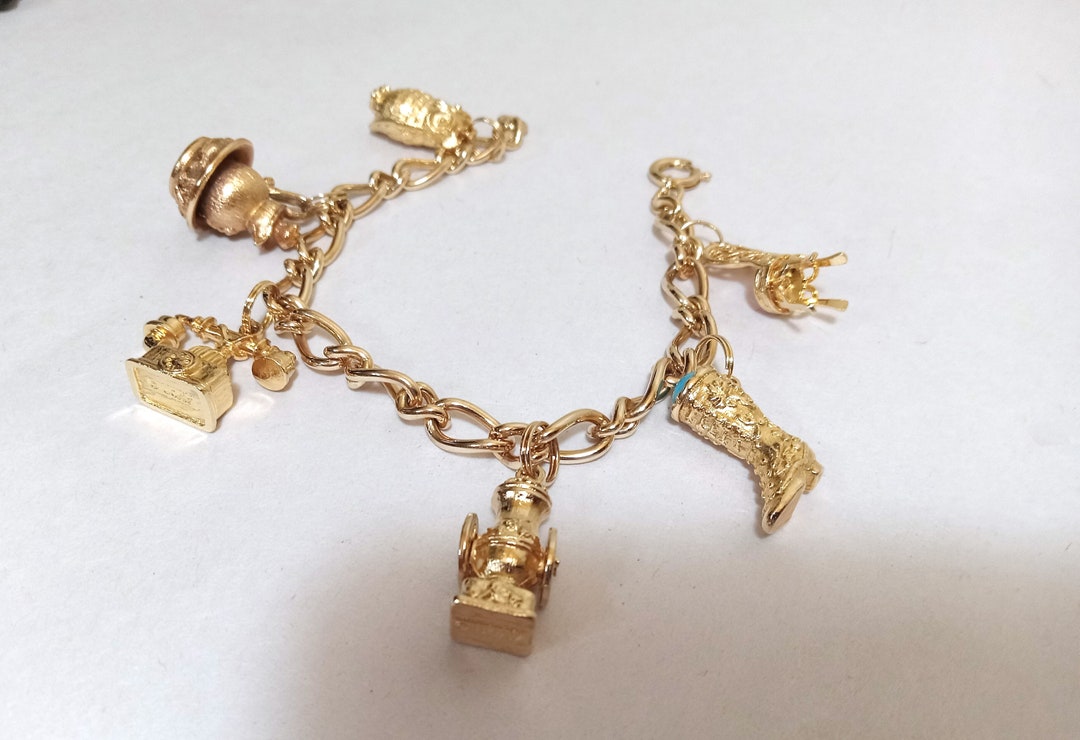 Vintage 1973 Gold Tone AVON Charm Bracelet; Vintage Gold Tone Charm ...