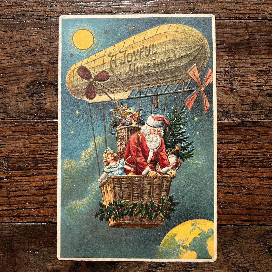 Vintage 1910 Joyful Christmas Postcard Santa Claus Flying in Dirigible Blimp Transportation ...