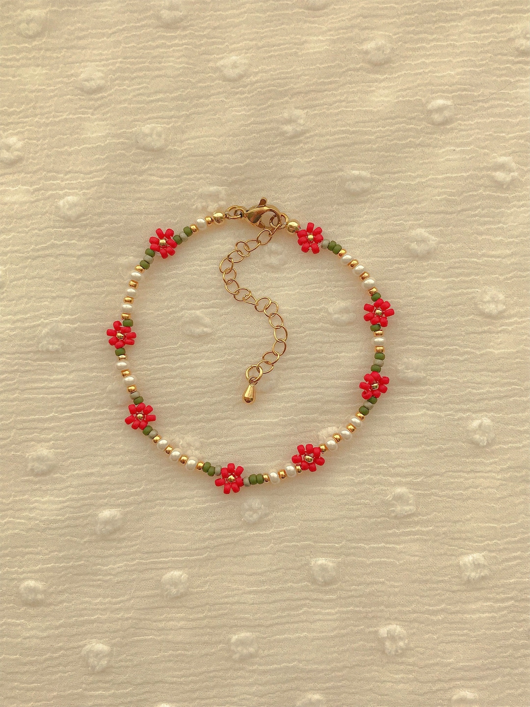 Eleanor Bracelet | Delicate Poinsettia Flower Bracelet | Dainty Seed ...