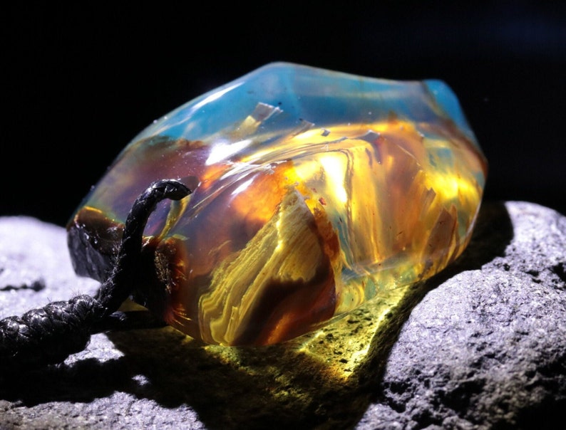 Zupertrillion Ultra Rare Blue Amber Pendant Crystal Clear Amber Rare ...