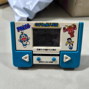 Game Doraemon Nobita and the Iron Legion, Doraemon's Adventure Maze LCD ...
