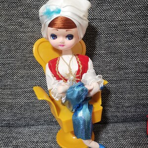 Vintage Pose Doll Japanese Big Eyes Girl Doll Sitting in a Chair Music ...