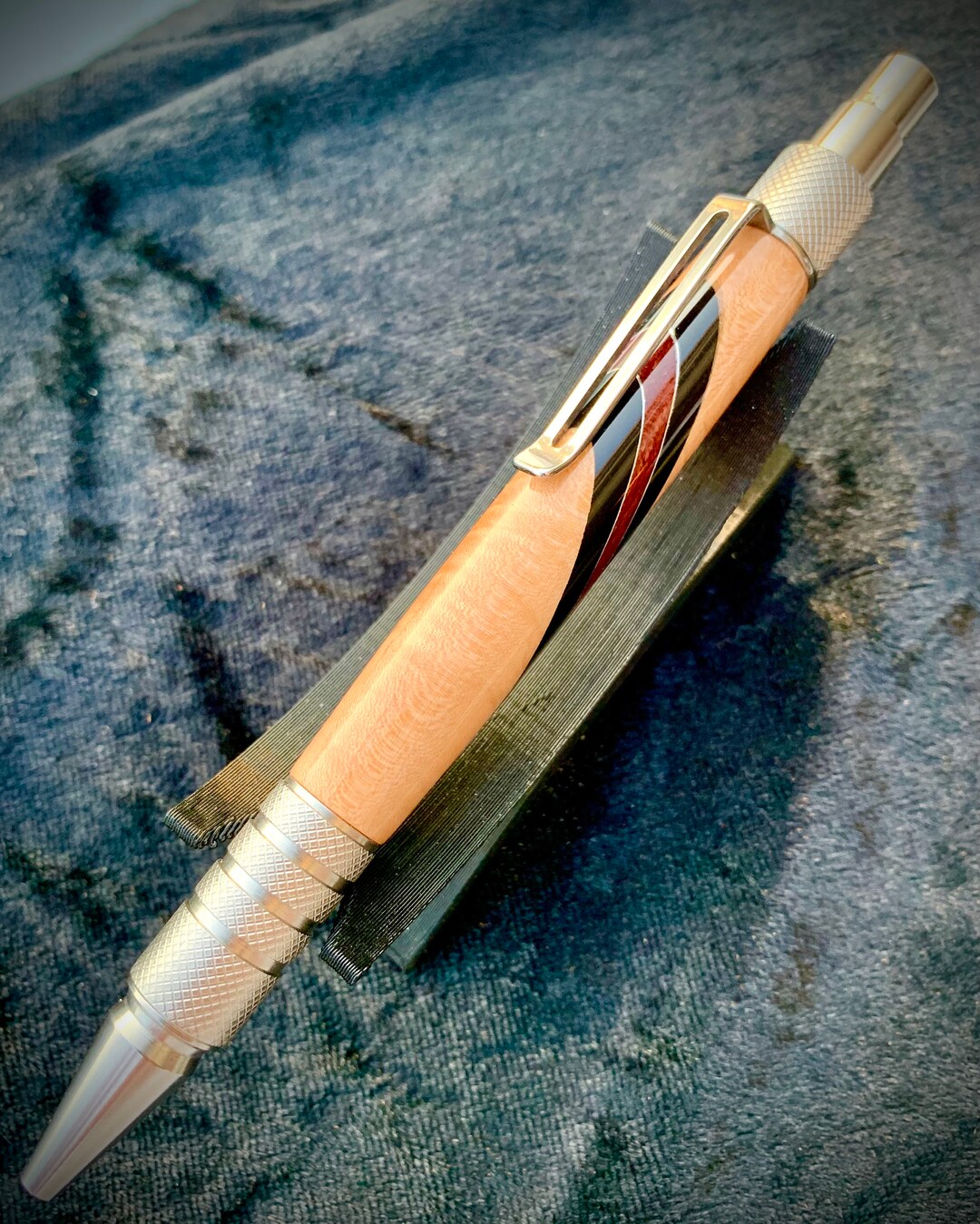 Custom hand-turned pen, made from Curley Maple, Ebony and Purple Heart ...