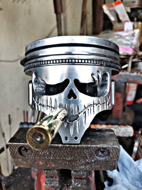 Skull Piston Carving