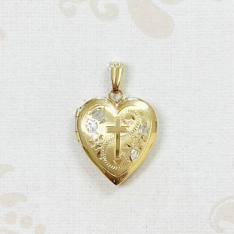 Heart locket with cross store