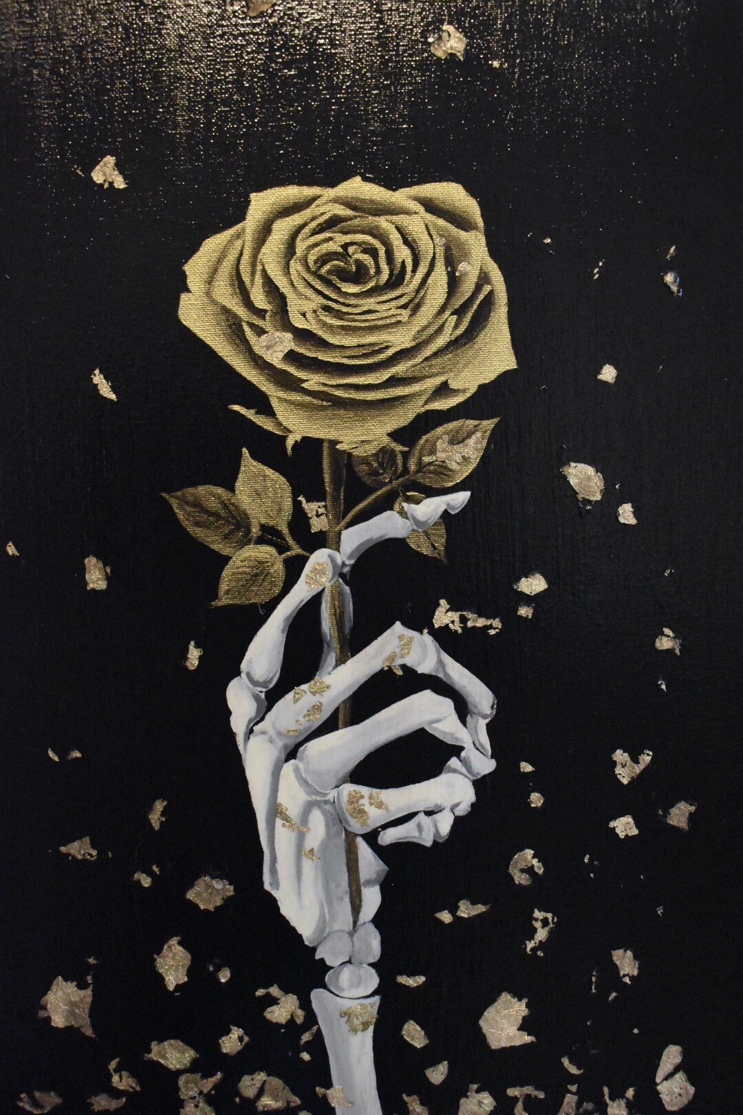 Skeleton Hand Holding Rose