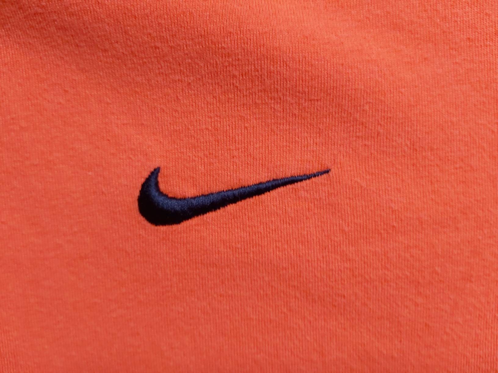 Orange Nike Swoosh