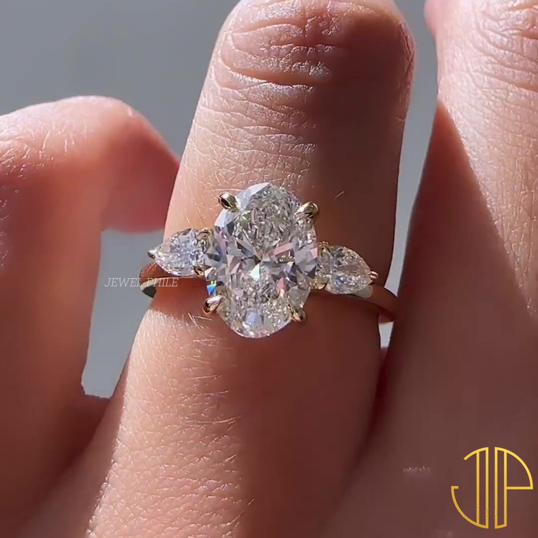 Three Stone Oval Engagement Ring Oval Engagement Ring With Pear Side ...