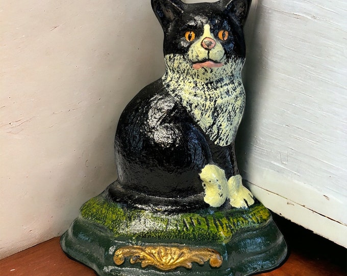 Vintage Black Cast Iron Cat Door Stop - Black and White Cat on Green ...