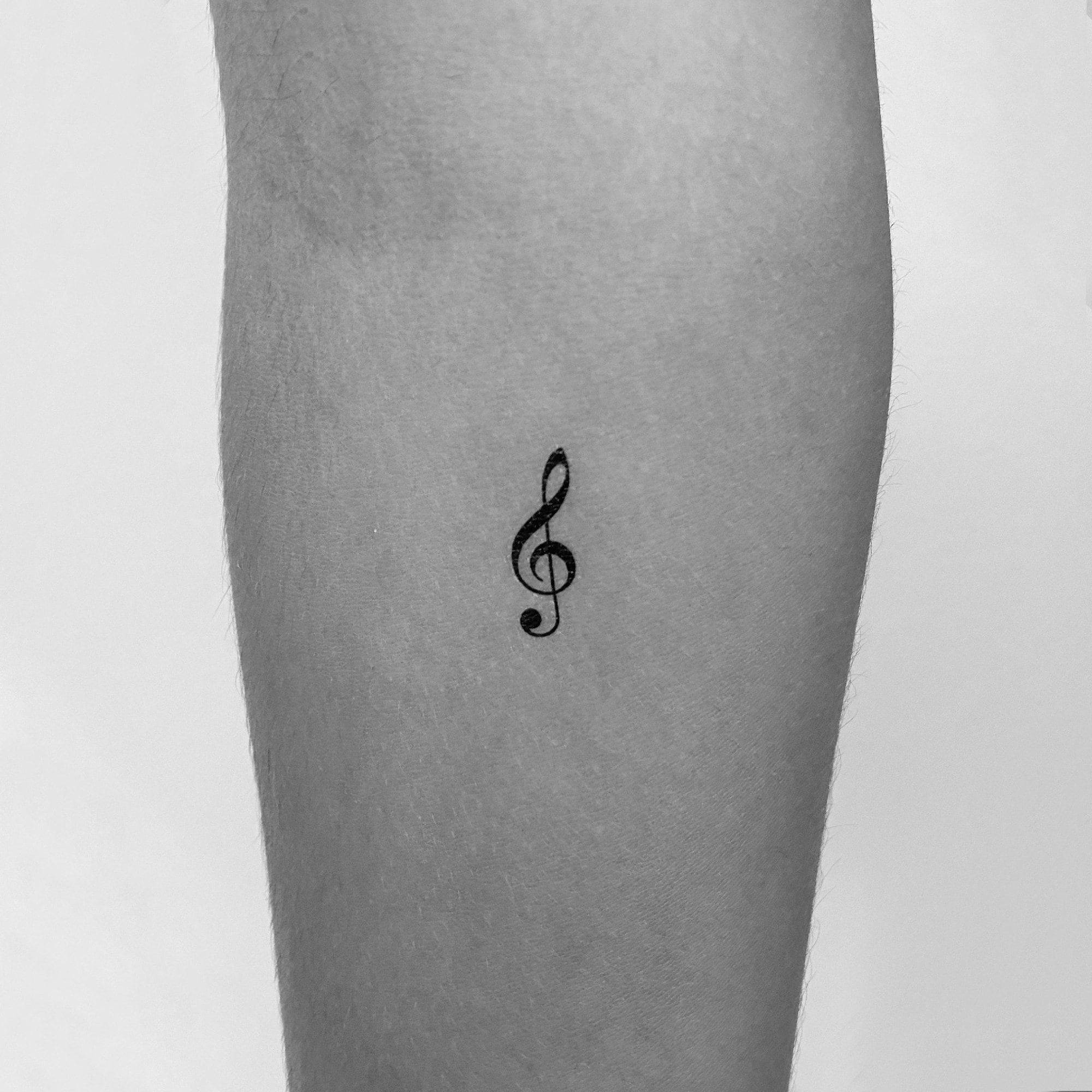 Fancy Treble Clef Tattoo