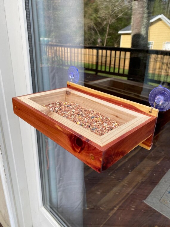 Window mounted bird feeders store