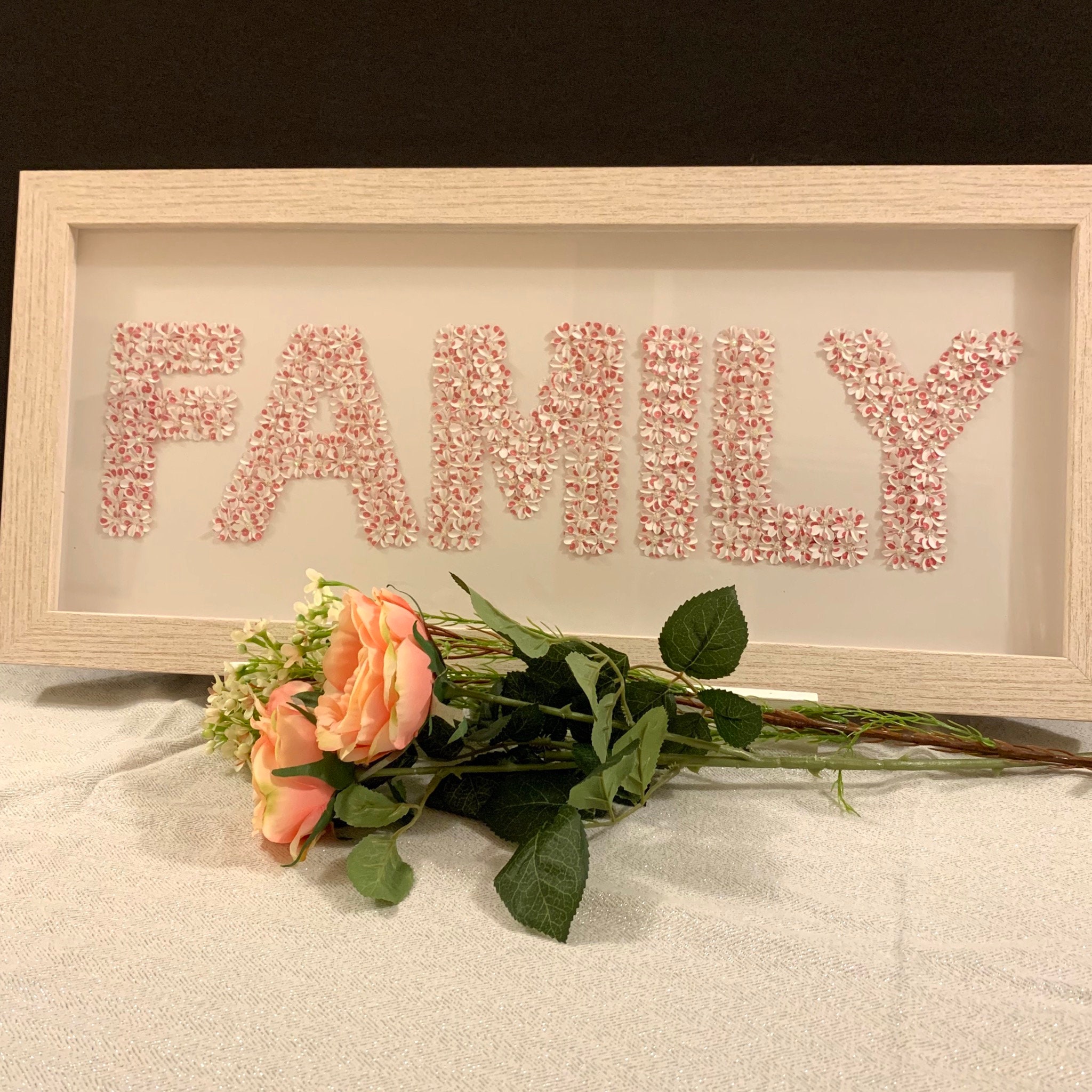 Family spelt out with small delicate handmade flowers then | Etsy