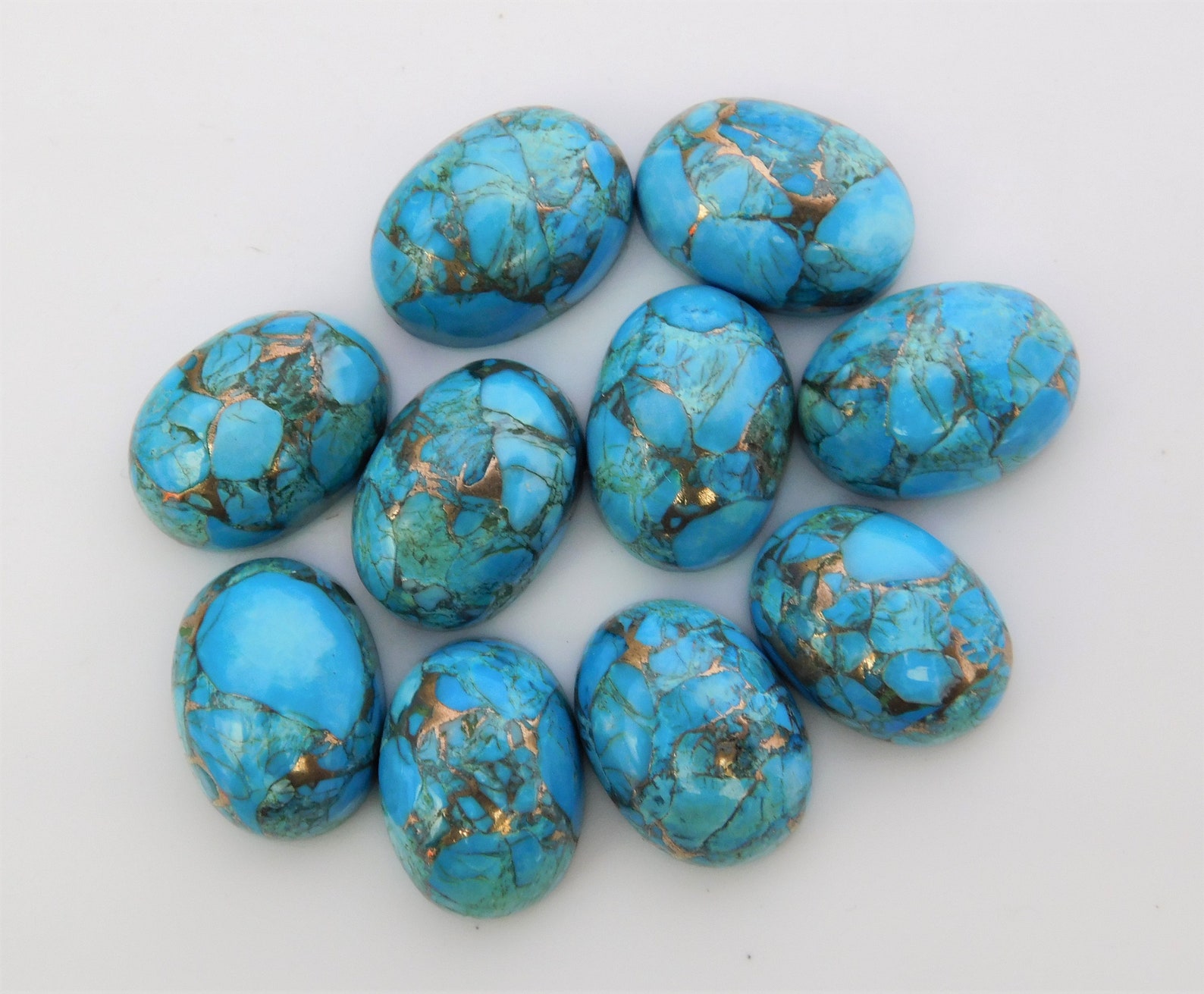 Buy Blue Mohave Turquoise Cabochon Oval Calibrated Sizes 5x7 Mm to ...