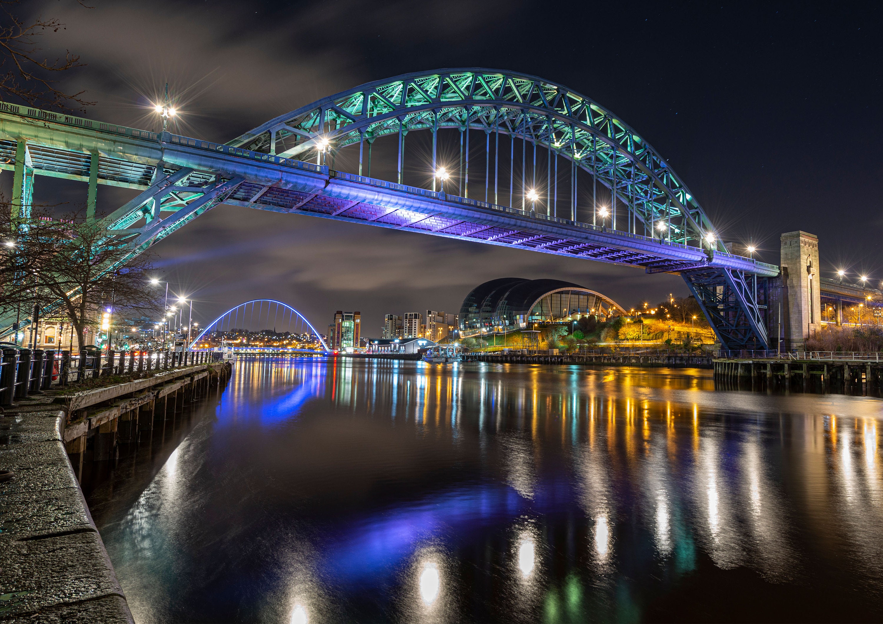 The Tyne Bridge and Quayside at night reflecting in The River | Etsy