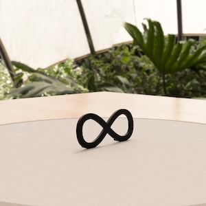 Minimalistic Infinity Statue: Symbol of Infinite Possibilities and ...