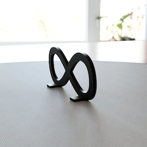 Minimalistic Infinity Statue: Symbol of Infinite Possibilities and ...