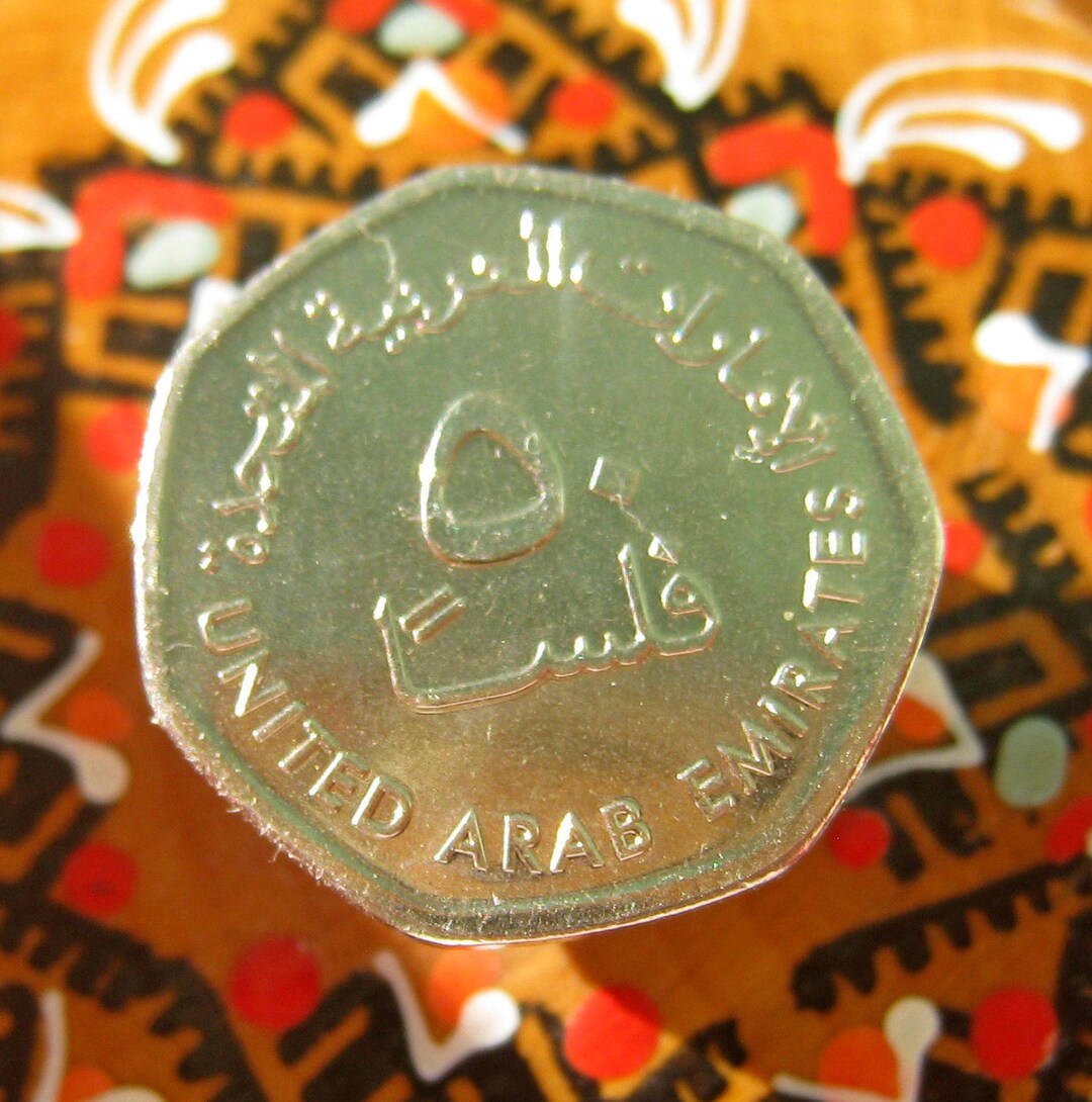 World Coins Fifty Fils of a UAE Dirham Depicting Oil Rigs on the ...