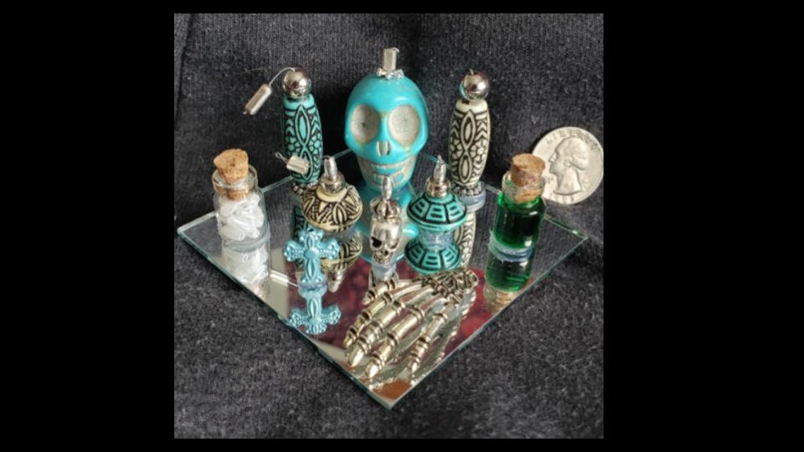 Voodoo or Hoodoo? Cleverly-crafted Potions and Bottles on Mirrored Tray ...