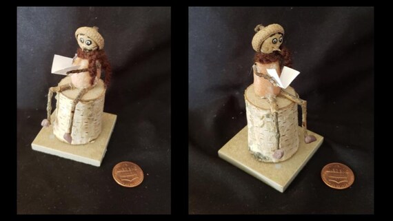 Miniature Figurine of Acorn Man Reading on a Tree Stump | Etsy
