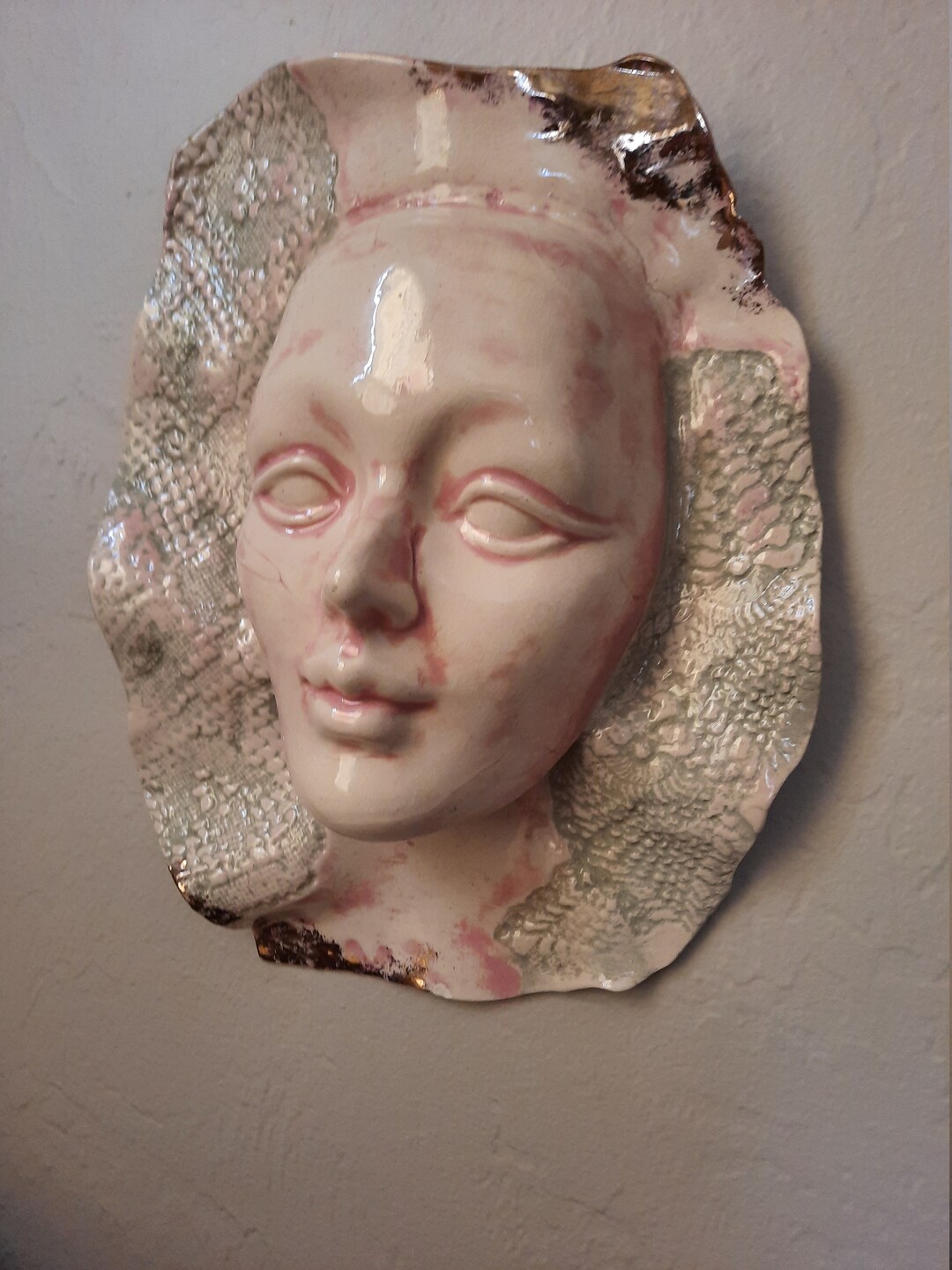 Handmade Clay Face Wall Sculpture With Lace Press Background and ...