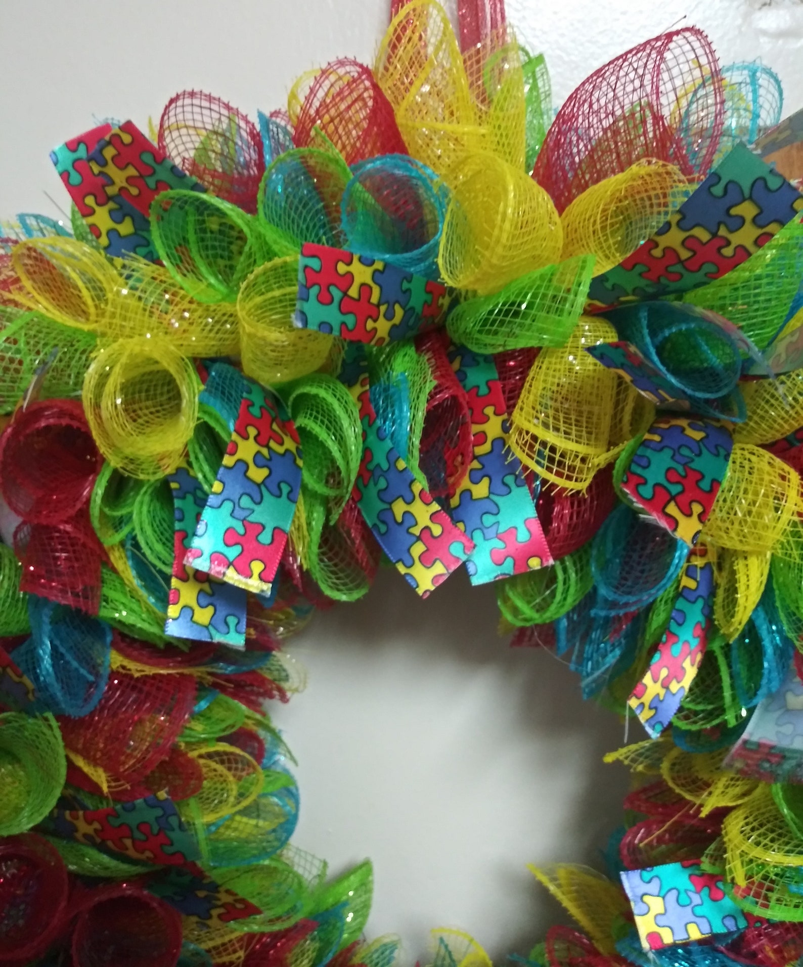 Autism Awareness Wreath With Deco Mesh, Puzzle Piece Ribbon, & Name ...