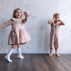 Kid's beige dress With long sleeves and pockets From | Etsy