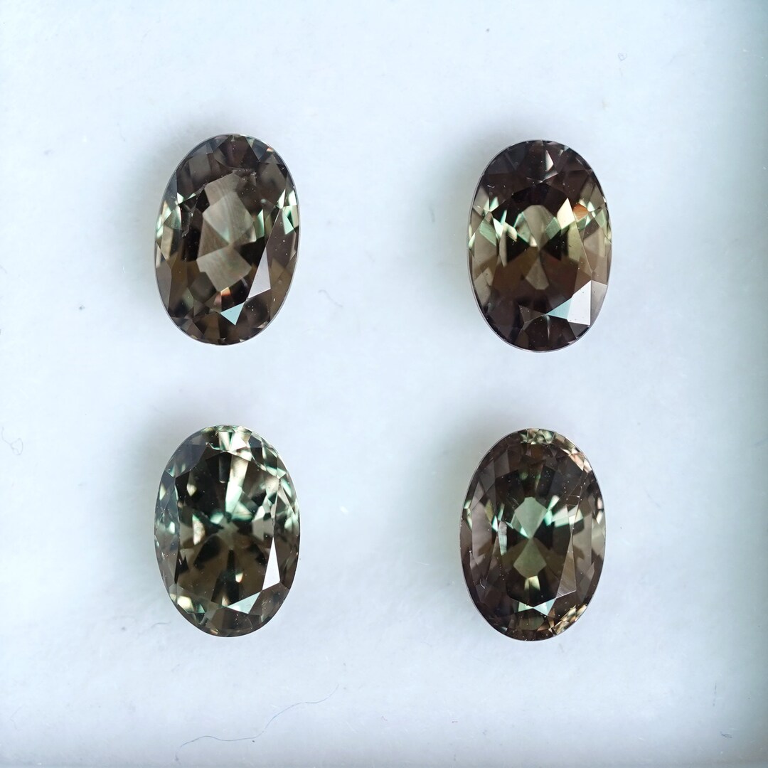 A Box of Mixed Natural Dark Olive Green Oval Shape Sapphires 4 Pcs, 6 ...