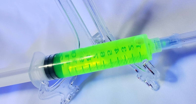 ReAnimator sealed Green Serum Syringe with stand | Etsy