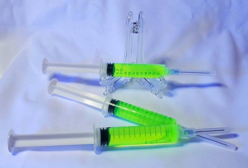 ReAnimator sealed Green Serum Syringe with stand | Etsy