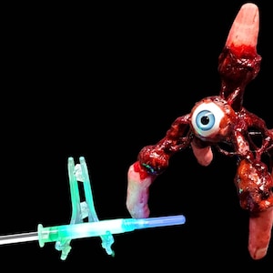 Reanimator Fingerling Eye Figure Sculpture Replica With Syringe - Etsy