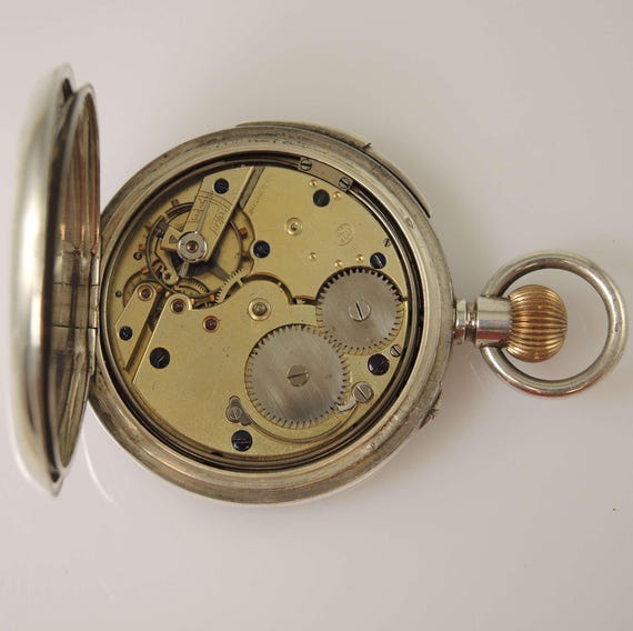 Silver quarter repeater pocket watch by Stauffer & Co… - Gem