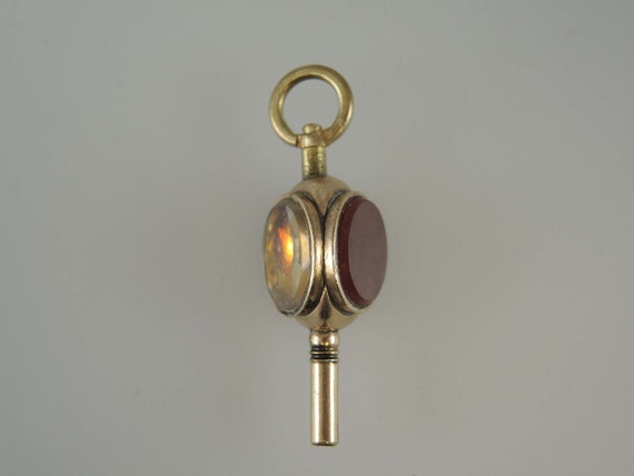 Victorian gilt three sided stone set pocket watch key… - Gem