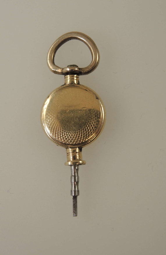 Rare pocket watch key with Female winding c1810 - Gem