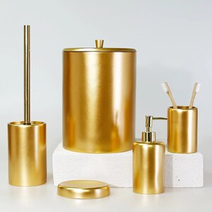 Victoria Cylinder Dustbin With Manuel Flat Lid in Gold Color / Resin ...
