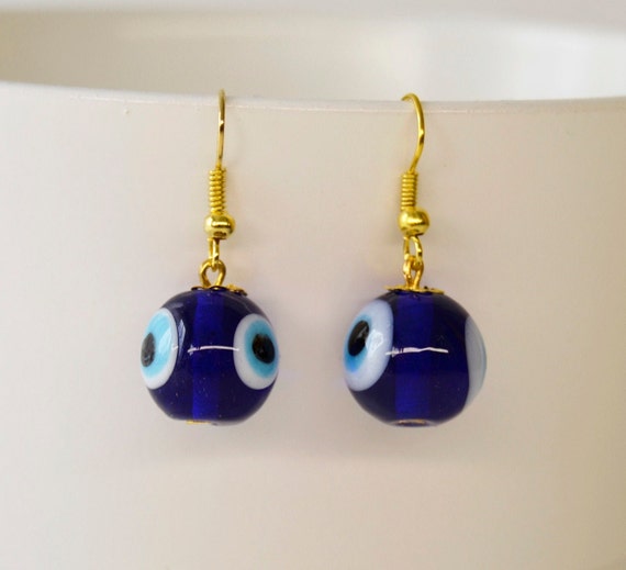 Blue and golden earrings store