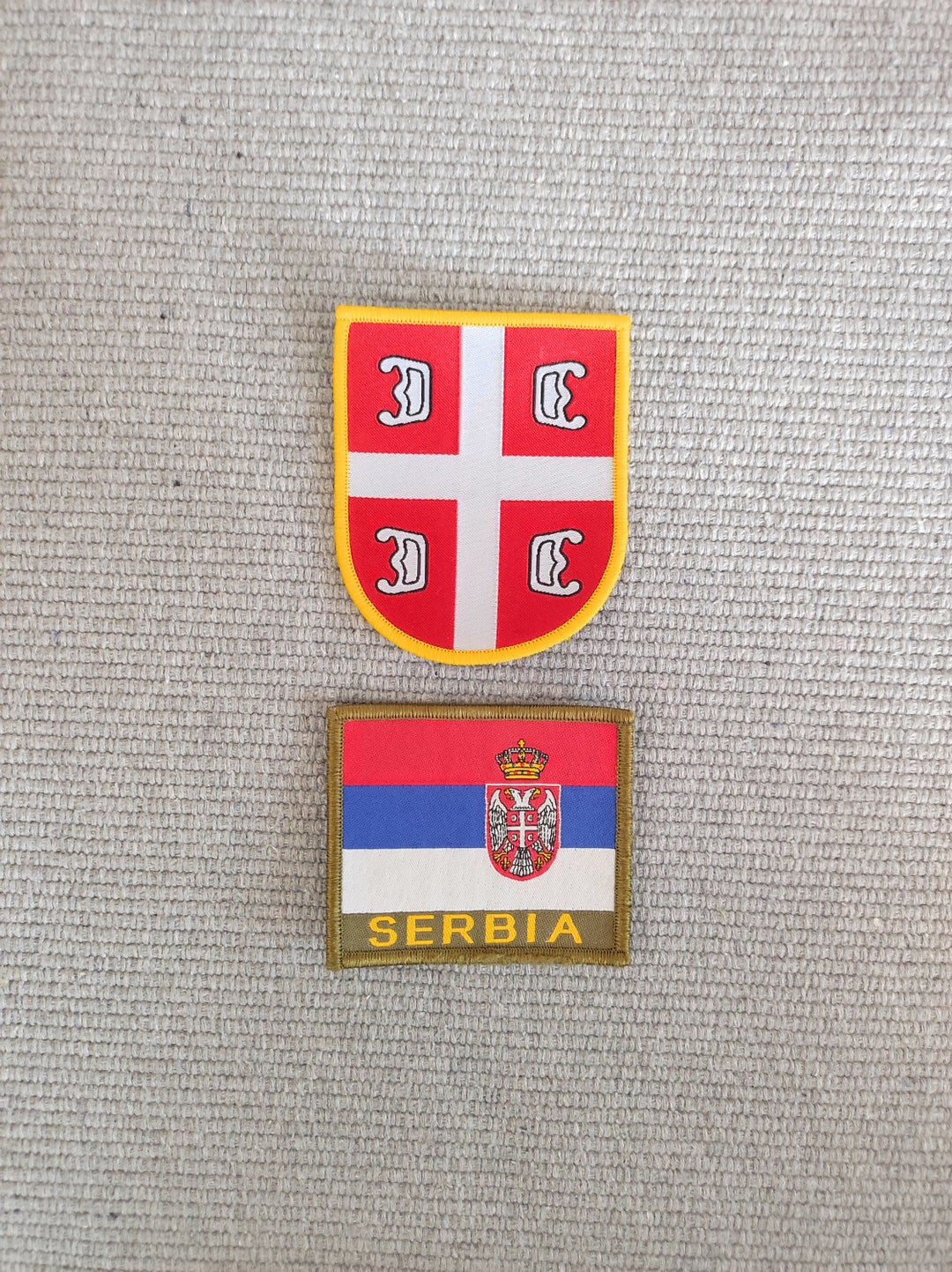The Military Insignia of a Serbian Soldier and the Flag of Serbia Worn ...