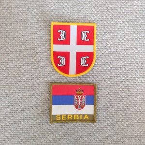 The Military Insignia of a Serbian Soldier and the Flag of Serbia Worn on the Uniform of a ...