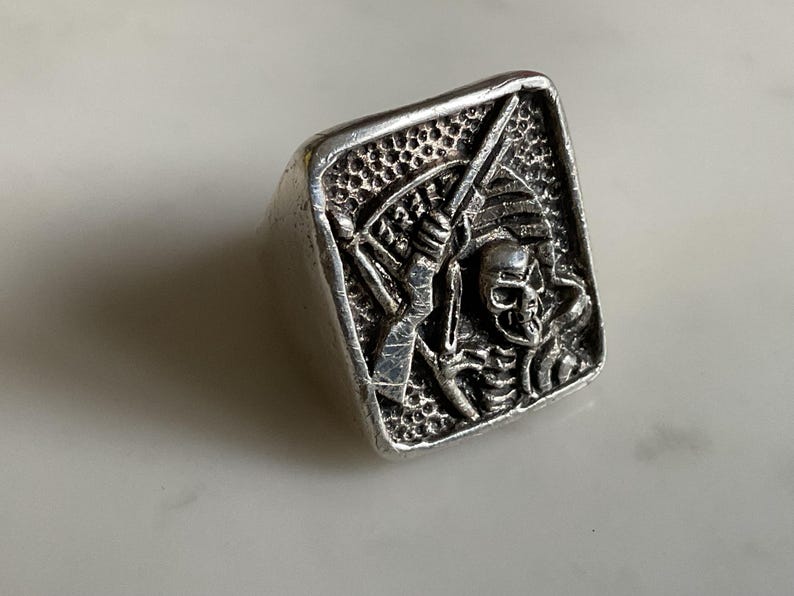 A Striking Vintage Sterling Silver Skeleton With Shotgun and US Flag ...