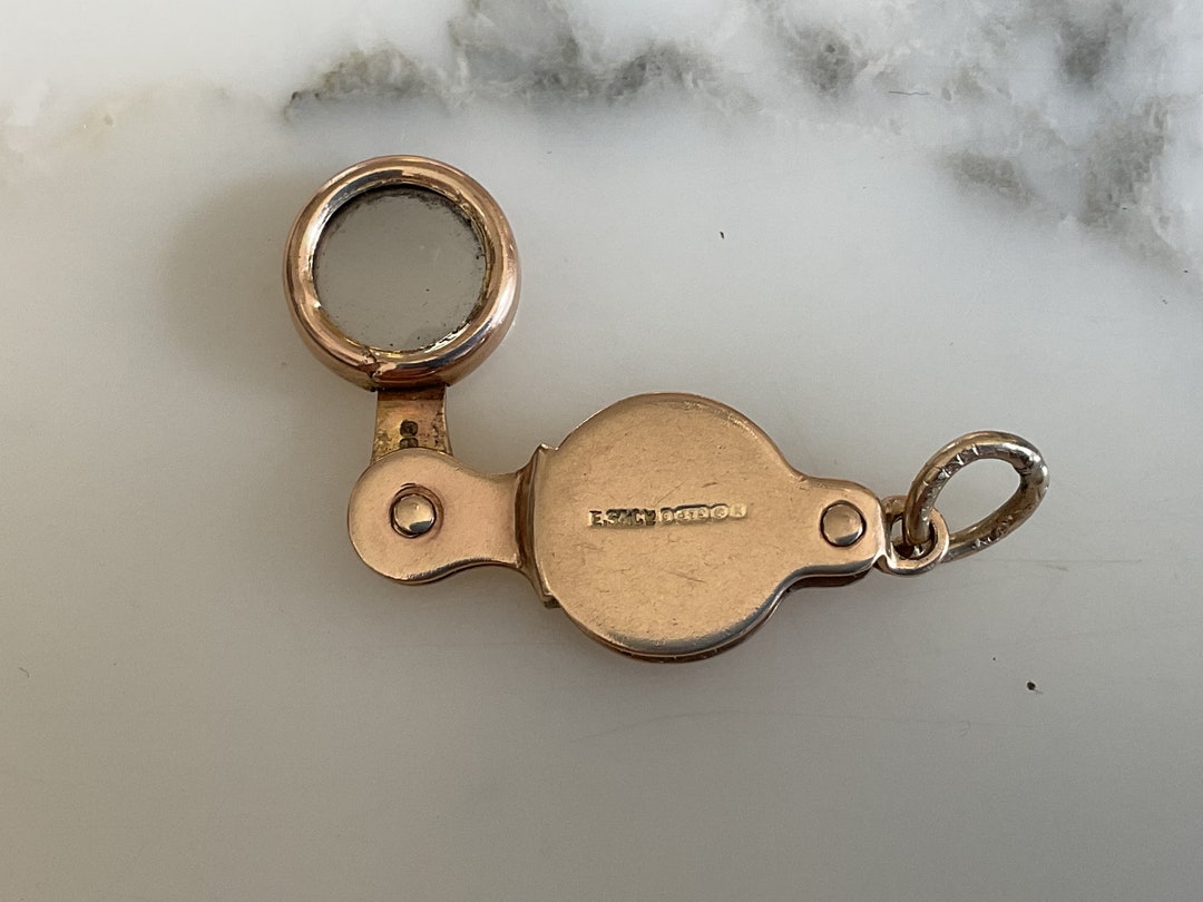 An Unusual and Useful Late Victorian 9 Carat Gold Folding Magnifying ...