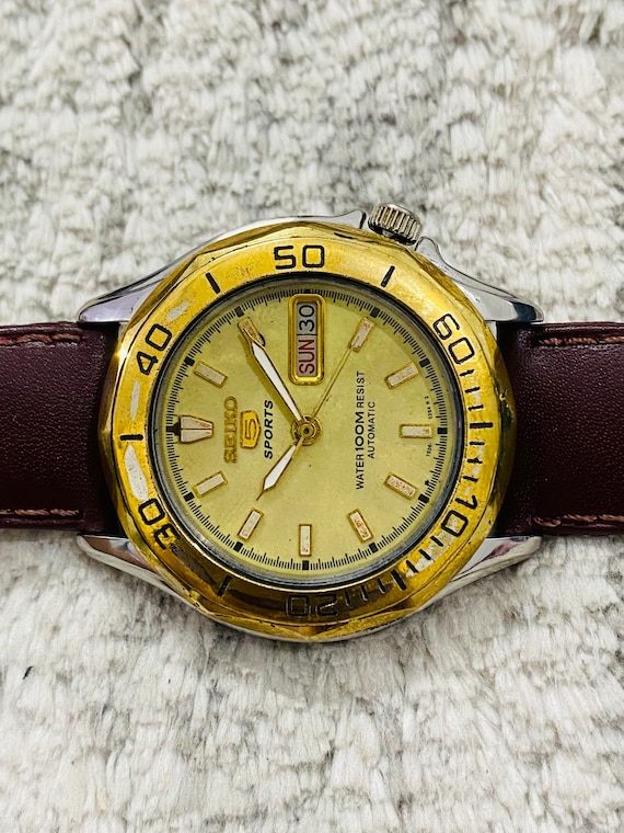 Vintage Seiko 5 Sports 100m Automatic Golden Dial Wit… - Gem