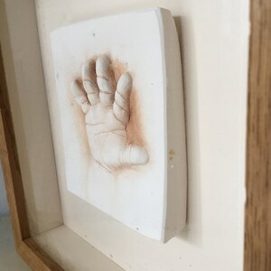Gypsum Handcrafted Little Hand in a Box-like Wooden Frame With Glass in ...