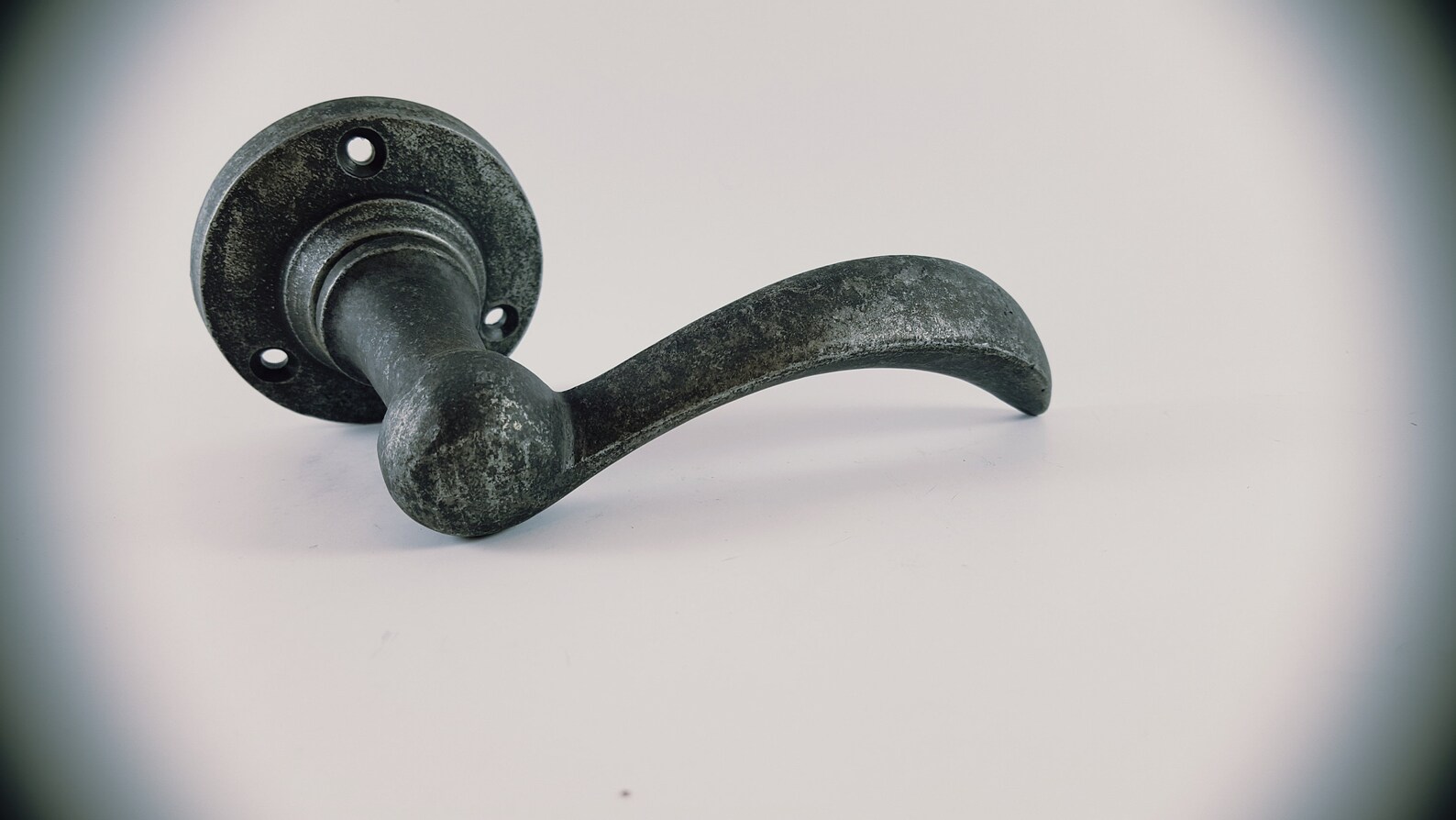 Antique Curved Cast Iron Lever Door Handle on Round Rose English ...