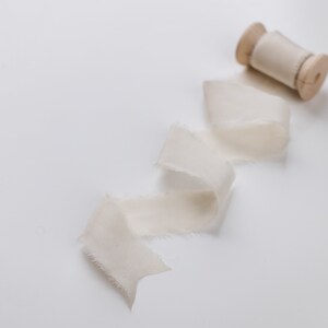 Swan White Frayed Edge Silk Ribbon With Wooden Spool Flat Lay Styling ...