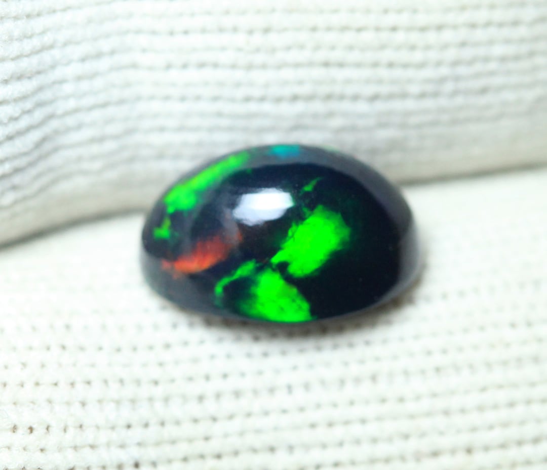 2.96 quilates ópalo etíope negro, forma ovalada de 12x8 MM, cabujón de ...