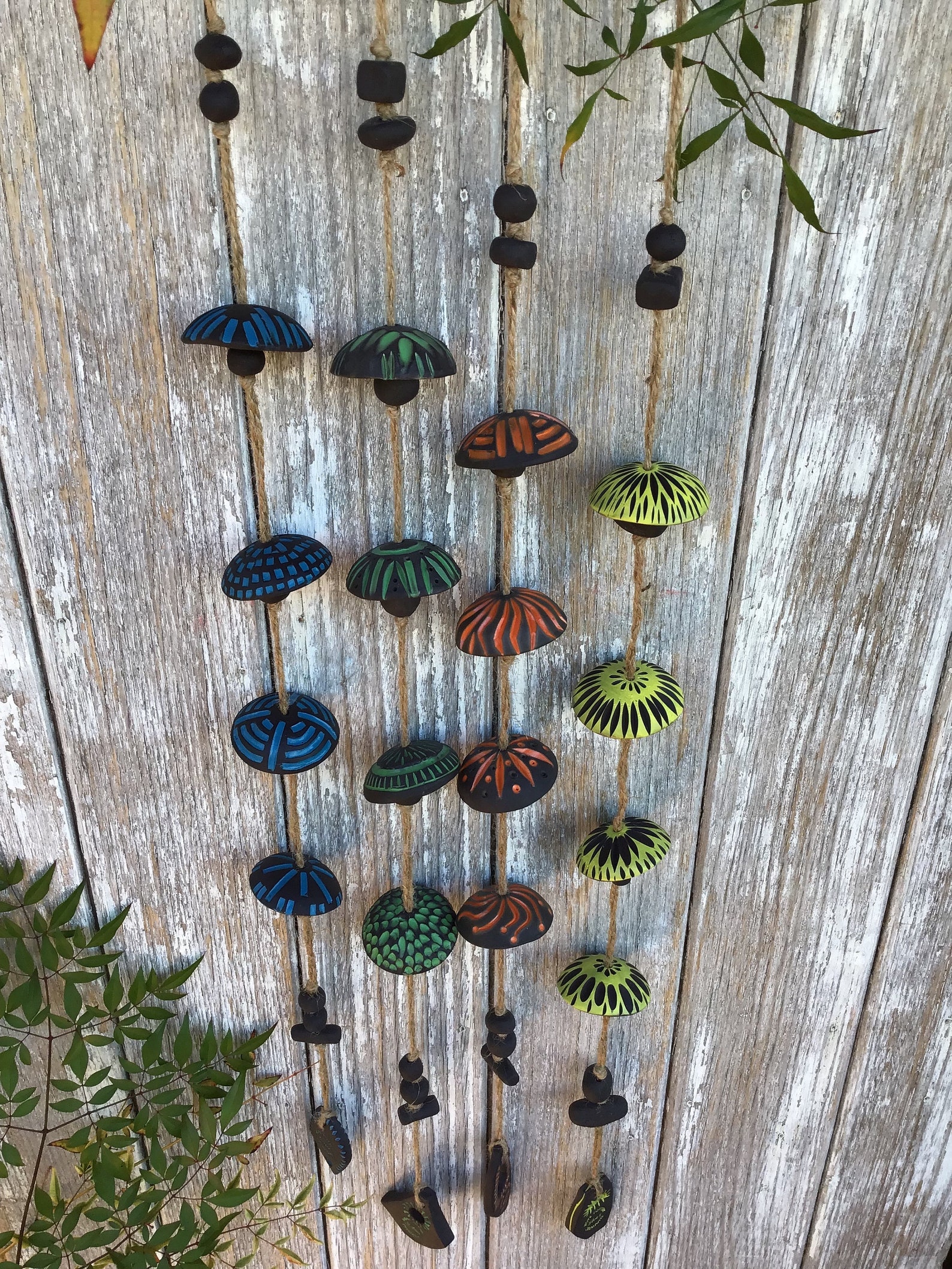 Pottery Wind Chime. Elegant Black Clay, White Cavings, Bare and Natural ...