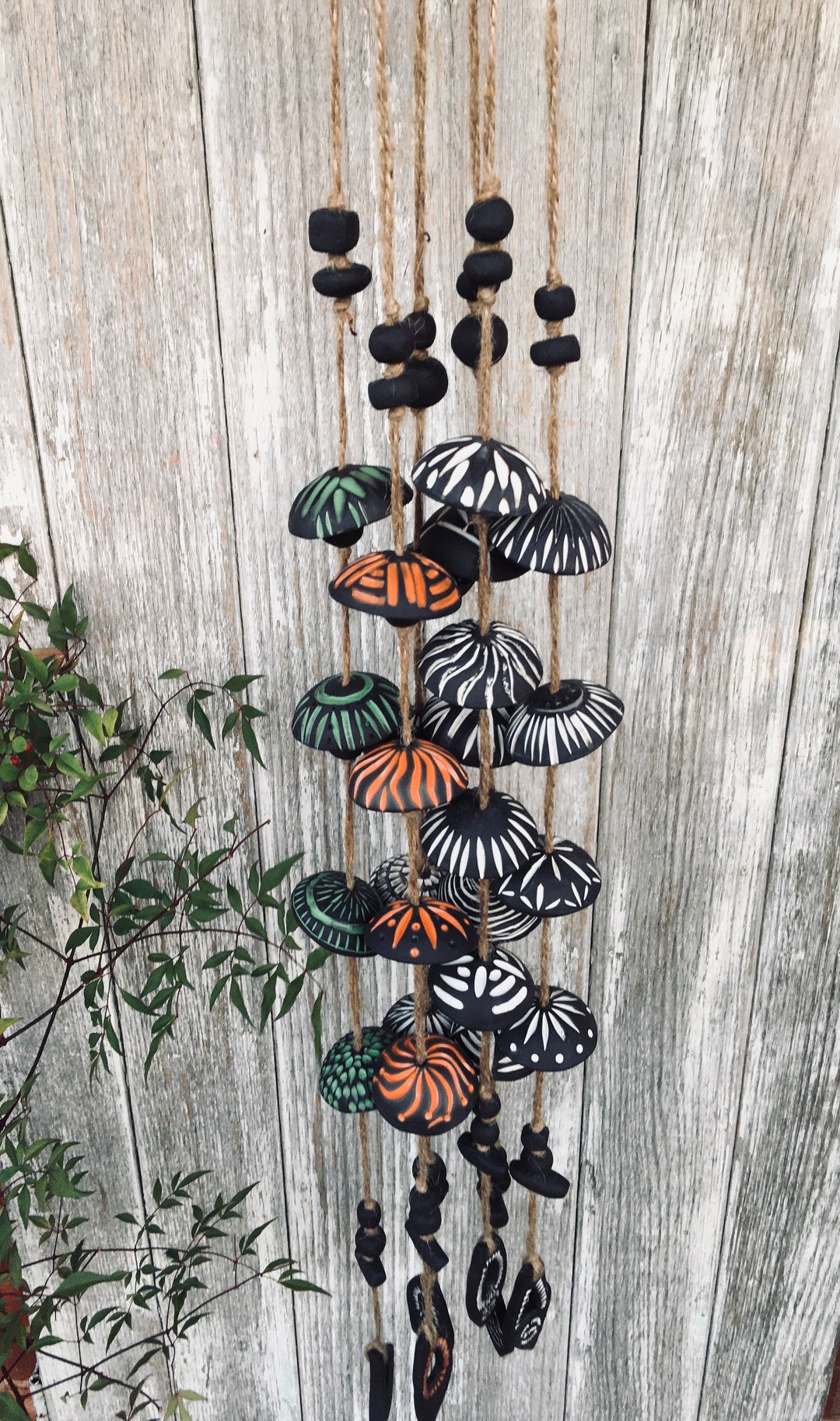 Pottery Wind Chime. Elegant Black Clay, White Cavings, Bare and Natural ...