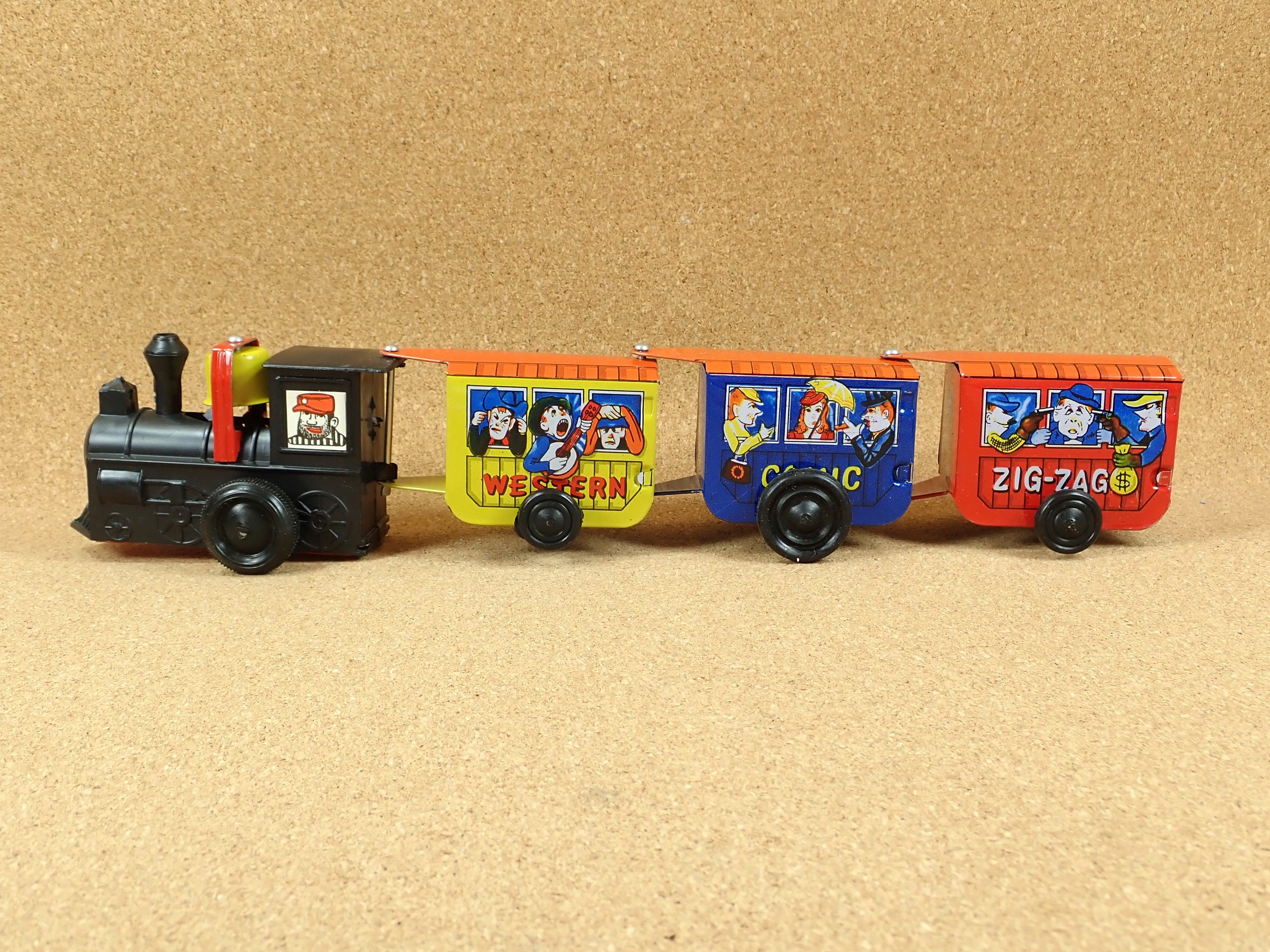 Wind-up Comic Zig-zag Express Tin Train by MTU 1970s Metal Wind-up Rolling Collectors Toy ...